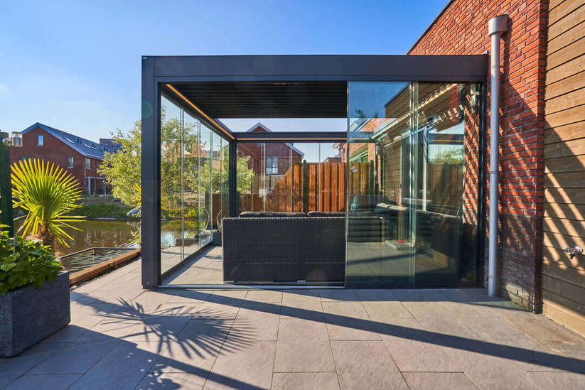 Pinela Deluxe Pergola glass room with sliding glass sides